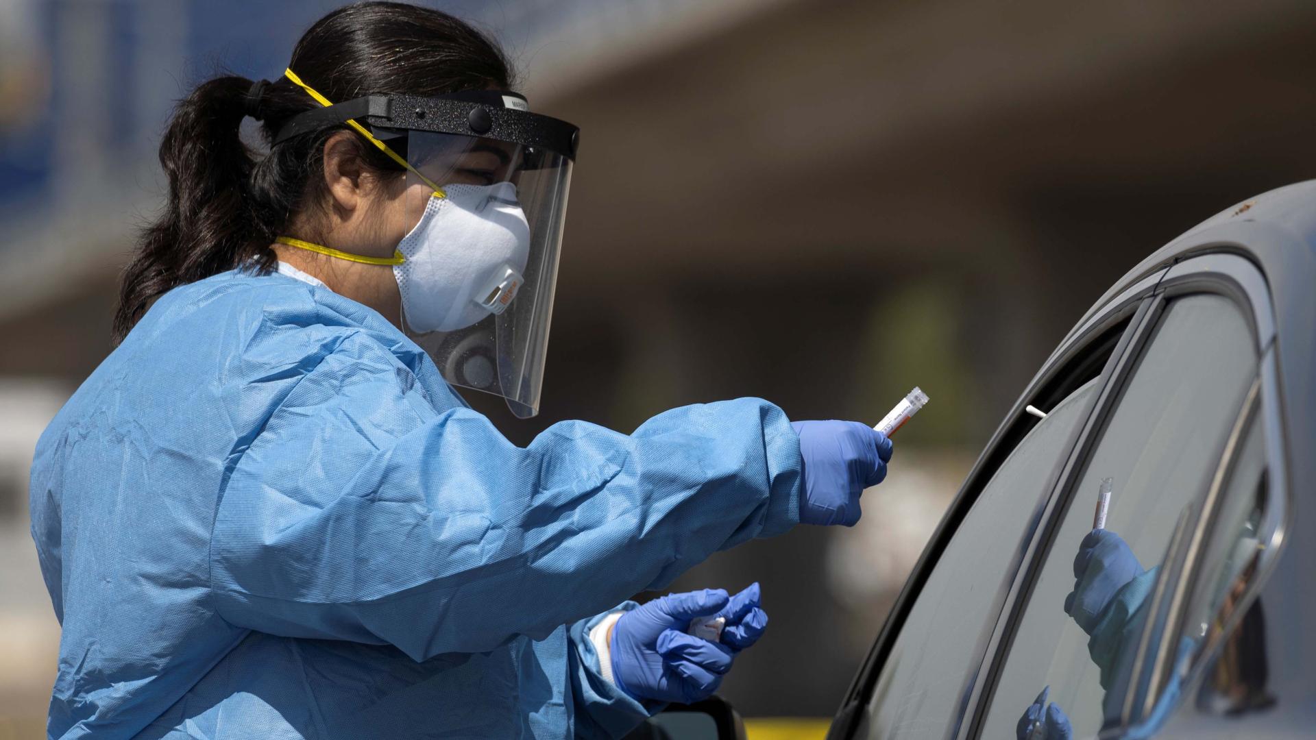 Alarming one-day COVID-19 record in U.S., states pause reopening plans ...