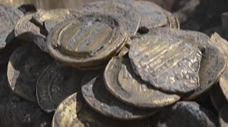 1,100-year-old pure gold coins discovered - CGTN