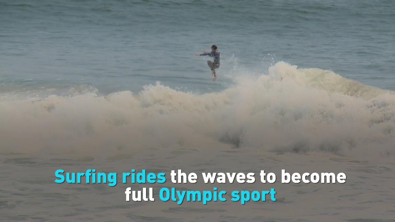 Surfing rides the waves to become full Olympic sport - CGTN