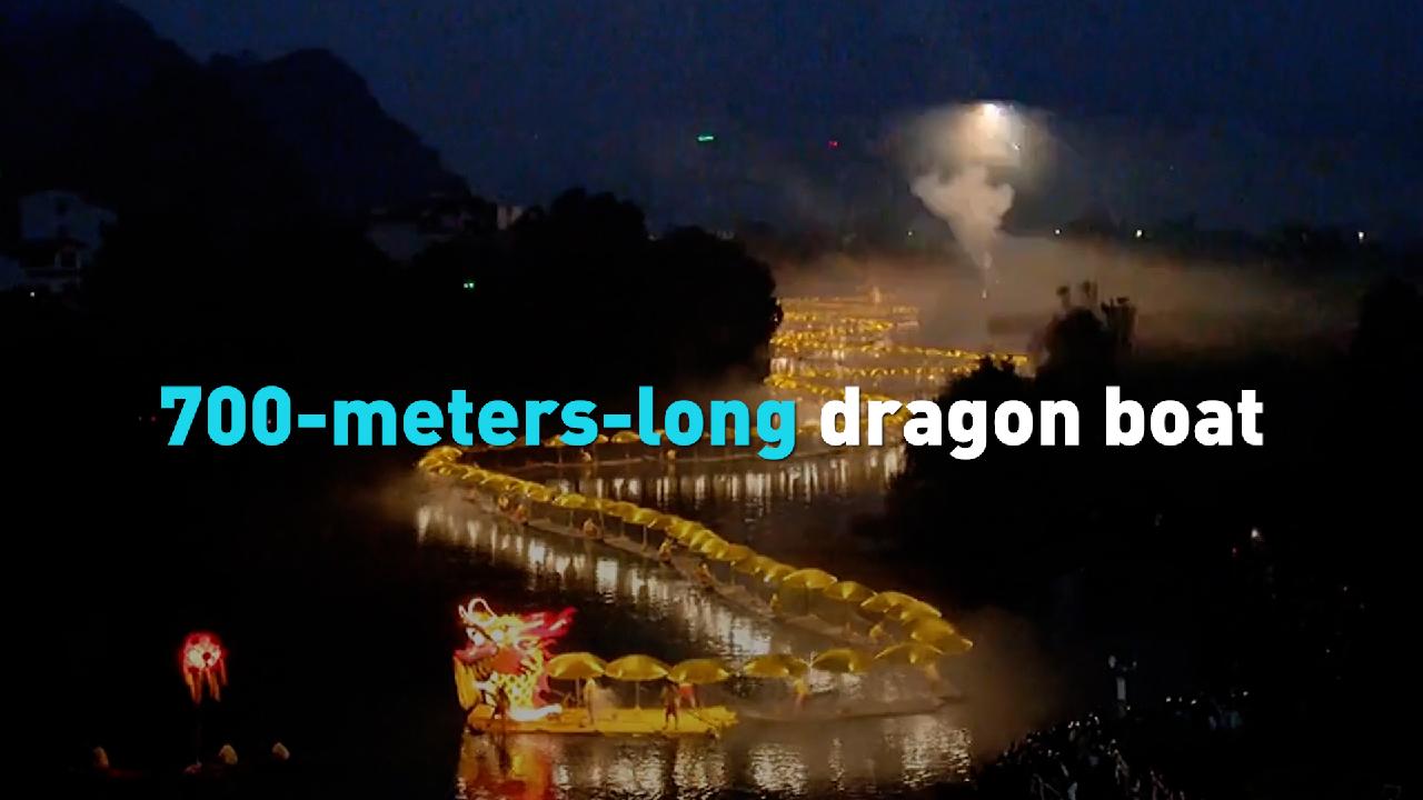 Check out the 700-meter-long (.4 mile) dragon boat - CGTN